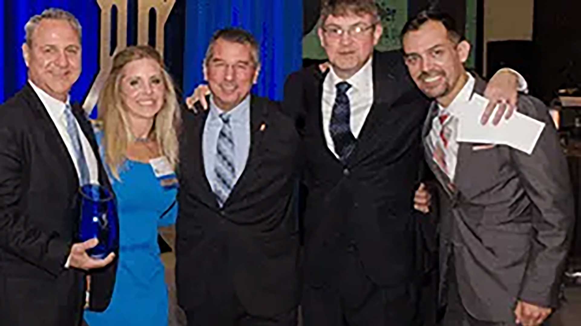 Agency Receives Prestigious Award from Erie Insurance Company - A.T ...